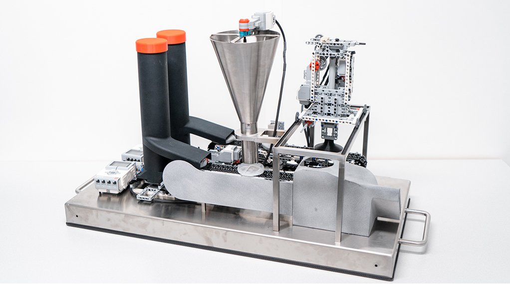 OPTIMA apprentices build miniature exhibition machine